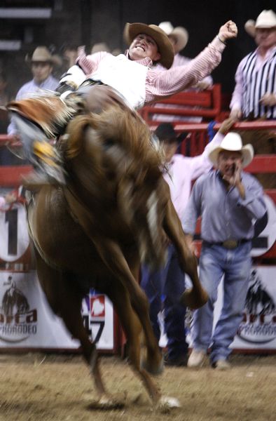 Heath Ford, Greeley, CO, rides Lady Red Hawk in the Bareback Riding ...