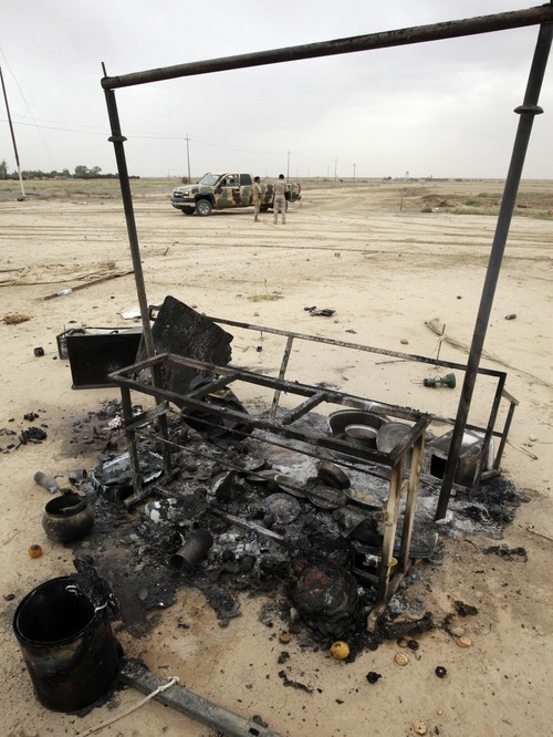 Iraq raids Iranian exile camp - The Salt Lake Tribune