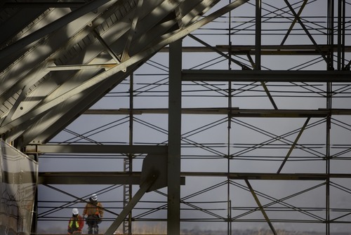 Crews top off giant Scheels store in Sandy - The Salt Lake Tribune