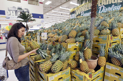 Macey's Pleasant Grove store stacks thousands of pineapples for spring ...