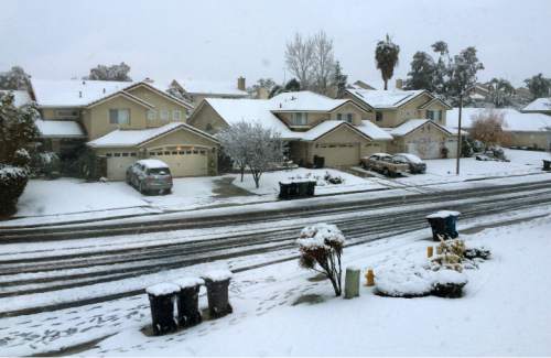 Storm brings snow, cold to Utah, West for New Year's - The Salt Lake ...