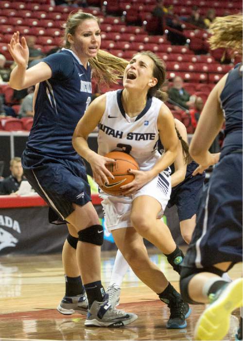 USU women's basketball: Aggies roll past Nevada in Mountain West ...