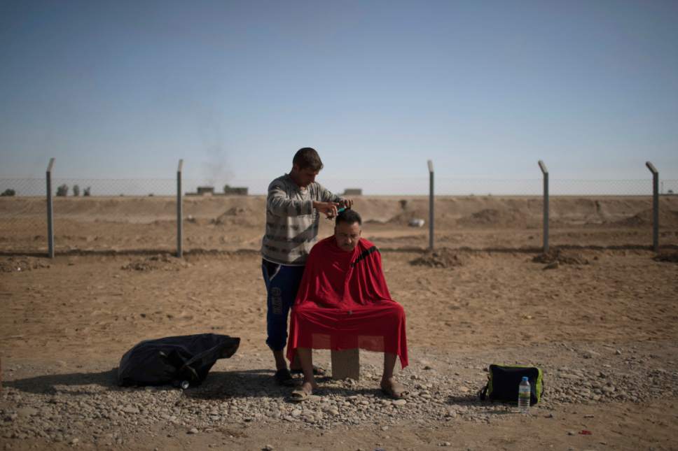 Heavy fighting as Iraqi troops drive deeper into Mosul - The Salt Lake ...