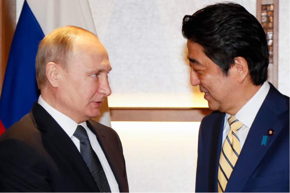 Putin, Abe hold talks on Japan-Russia territorial dispute - The Salt ...