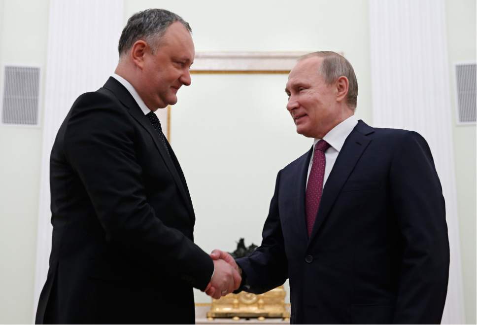 In Russia, Moldovan president hints end of EU pact - The Salt Lake Tribune