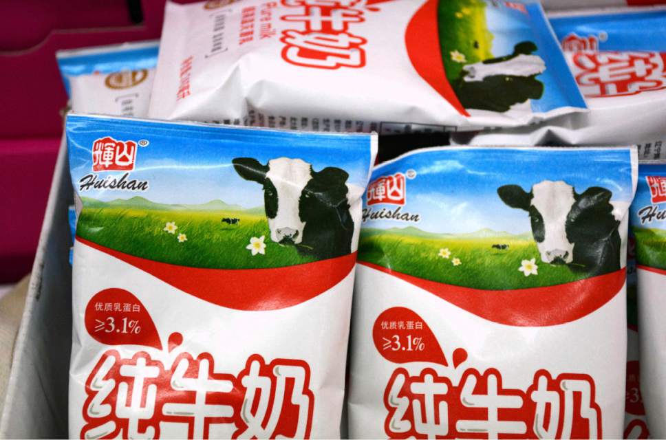 China dairy firm can't contact exec after stock dive - The Salt Lake ...