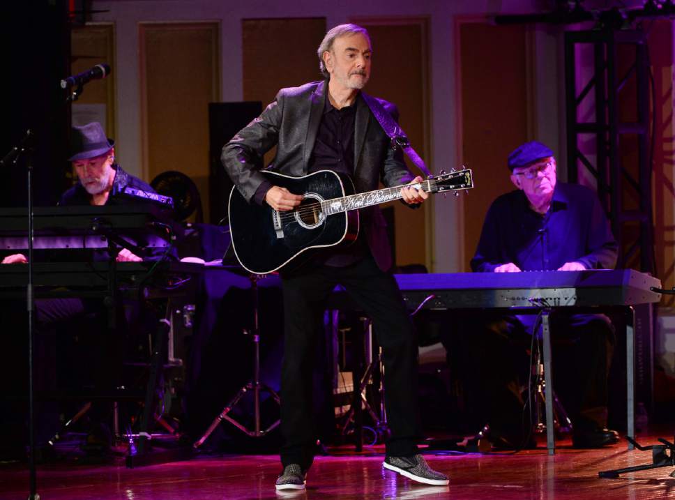 Singer-songwriter Neil Diamond performs at his former high school ...
