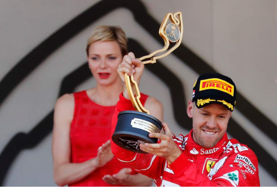 Auto racing: Vettel happy again after extending lead with Monaco GP win ...