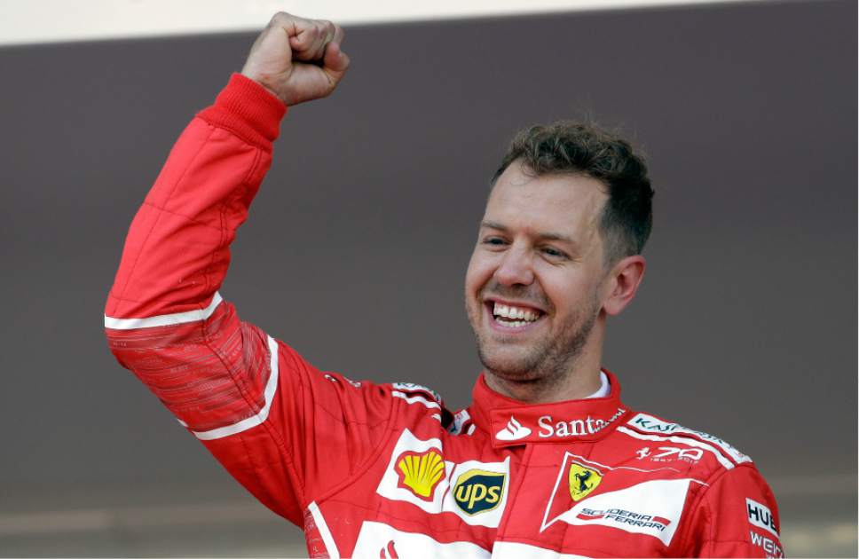 Auto racing: Vettel happy again after extending lead with Monaco GP win ...