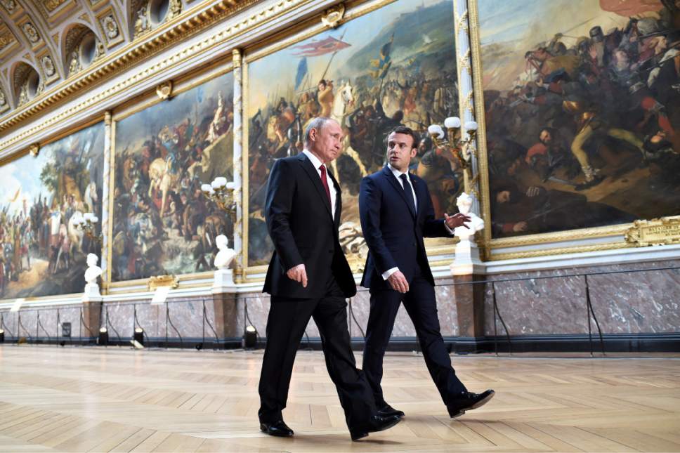 French president flexes diplomatic muscles in Putin meeting - The Salt ...