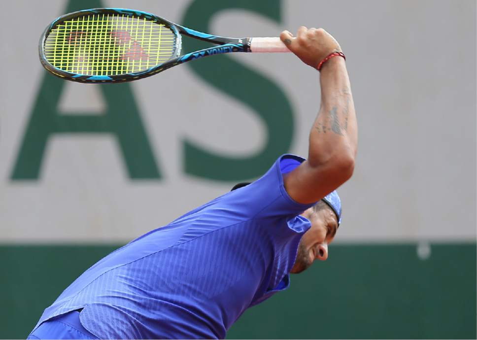 Tennis: Breaking rackets along the way, Nick Kyrgios exits French Open ...