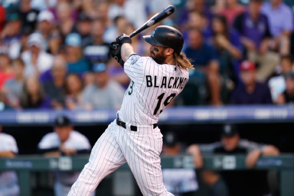 MLB: Complete with bushy beard and mullet, Charlie Blackmon leads ...