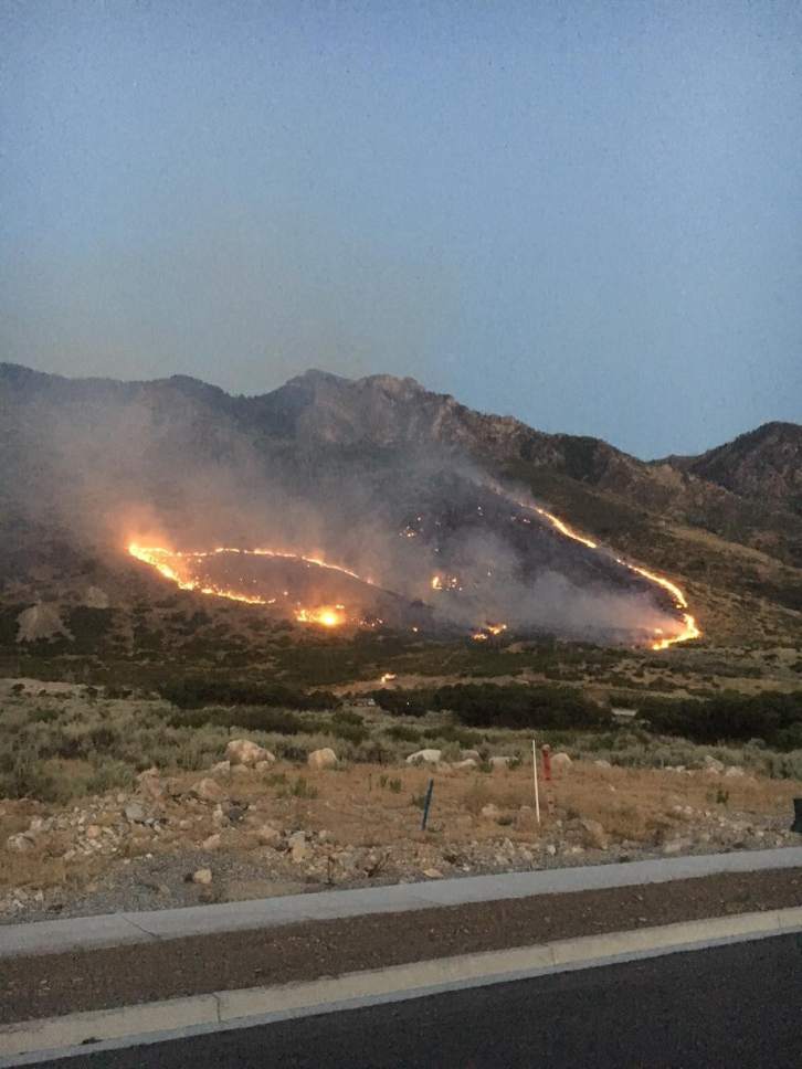 Crews making progress hemming in human-caused Utah County blaze - The ...