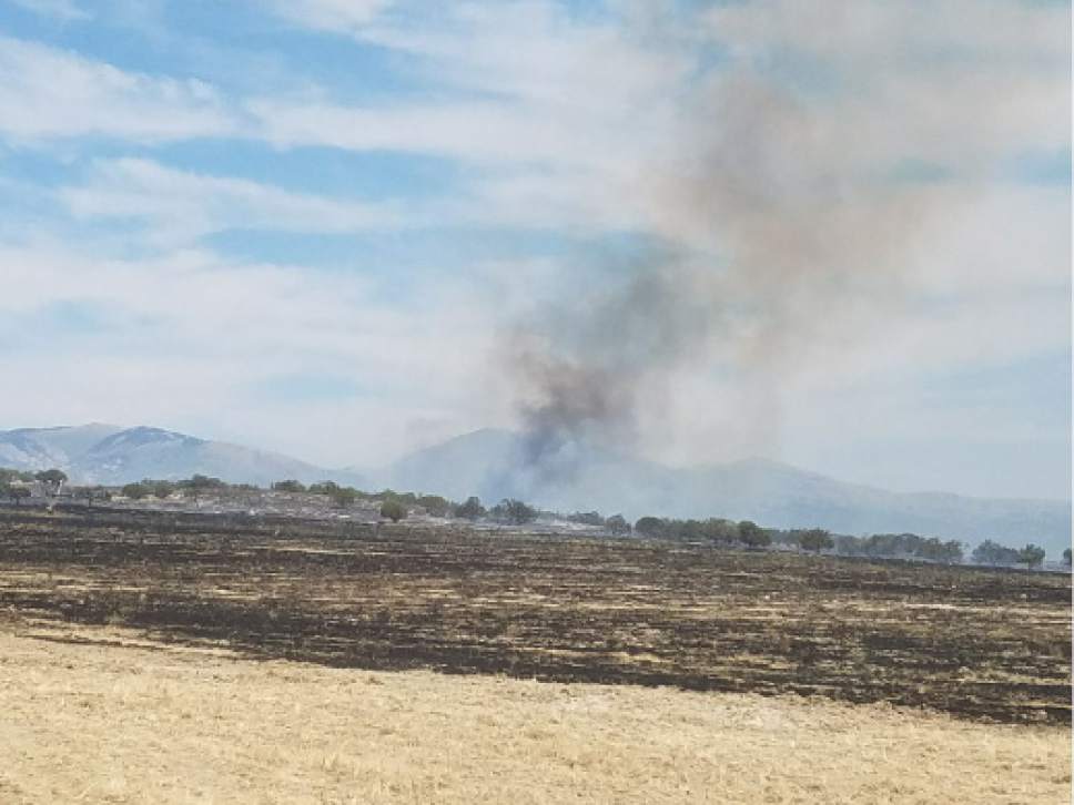 Wildfire threatens houses, burns 703 acres in Box Elder County - The ...